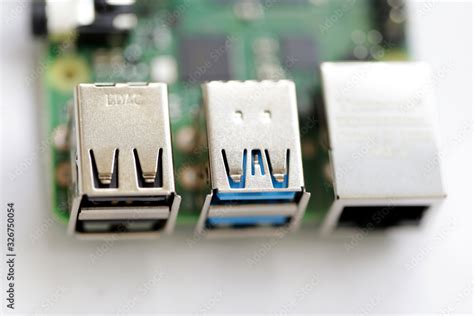 RJ And USB Ports Closeup On Raspberry Pi Board The Raspberry Pi Is A Credit Card Sized