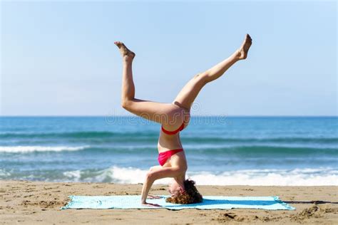 Slim Lady Performing Yoga On Coastline Stock Image Image Of Posture