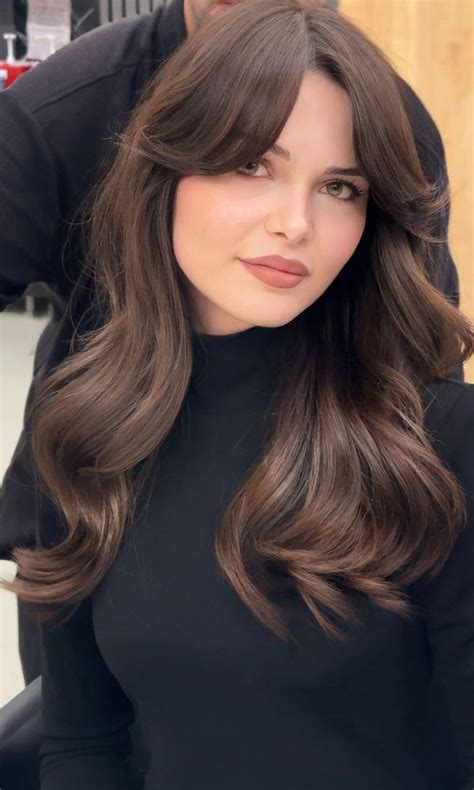 Long Hair With Curtain Bangs In Cool Ash Brown Soft Waves And Face