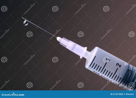 Injection Syringe Vertically With Needle On Pink Background Stock Image