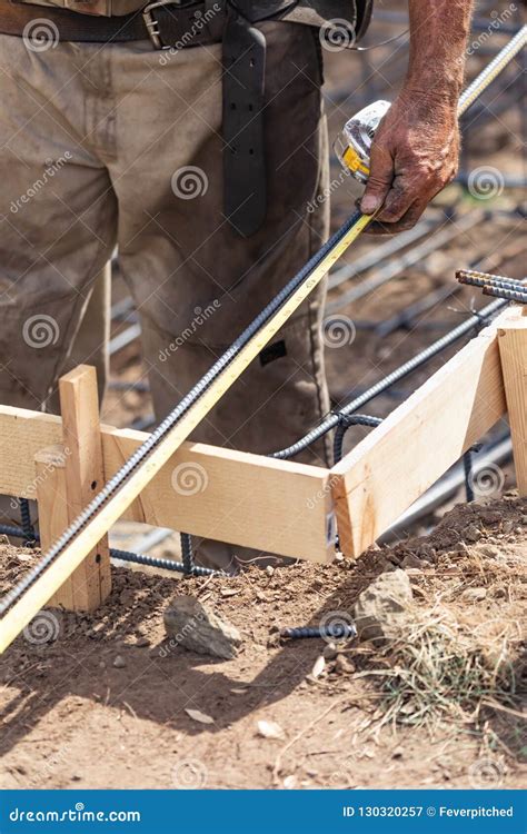 Worker Measuring Steel Rebar At Construction Site Stock Image Image Of Structure Estate