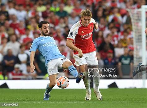 Martin Odegaard Of Arsenal Passes The Ball Under Pressure From News Photo Getty Images