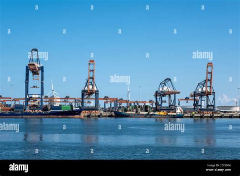 Coal Terminal Wih Big Industrial Cranes For Handling Coal