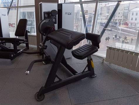 Тренажер «Бицепс/Трицепс сидя» для верхней части тела - KRAFT Fitness EXACT