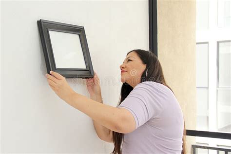 40 Year Old Latina Woman Decorates Her New Apartment That She Bought