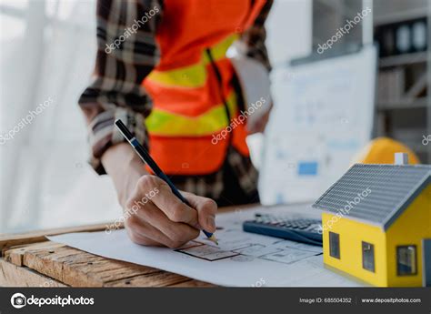 Engineer Brainstorming Measuring Cost Estimating Blueprint Floor Plan