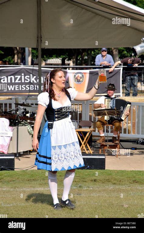 Girl With Beer In Traditional German Costume At Oktoberfest Addison