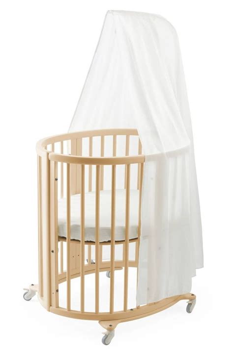 Cradle Your Newborn In A Beautiful Oval Shaped Beechwood Mini Crib That
