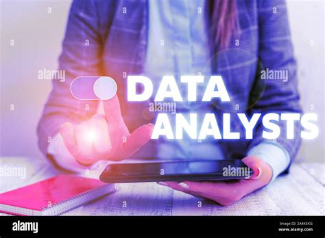 Conceptual Hand Writing Showing Data Analysts Concept Meaning