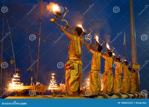 Priests Perform The Holy Ganga Aarti Ceremony Rituals With Fire At Dawn