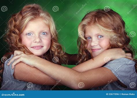 Two Naked Girls Holding Each Other