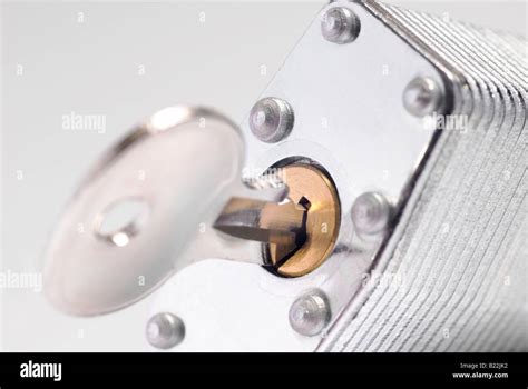 Key In A Padlock Stock Photo Alamy