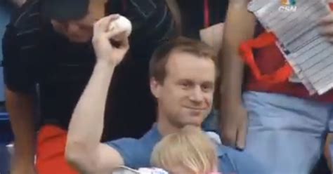 Super Dad Catch A Baseball While Holding Sleeping Daughter At Phillies Game