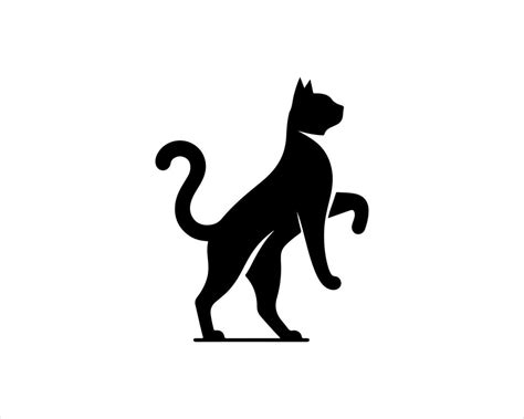 A Cat Is Standing On Its Hind Legs In A Black Silhouette 52979350