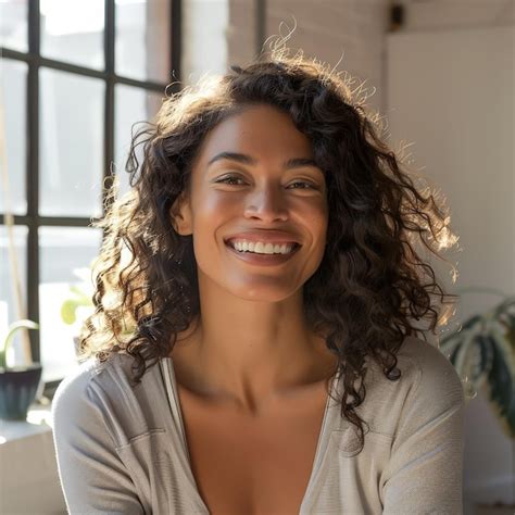 Premium Photo Smiling Woman With Curly Hair