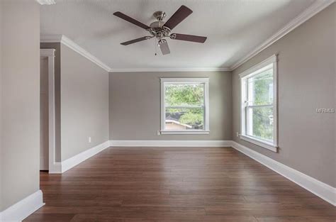Gray Walls With Warm Wood Floors Ghislaine Marcus