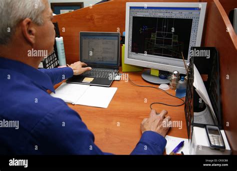 Adult Business Man With A Computer On His Desk Stock Photo Alamy
