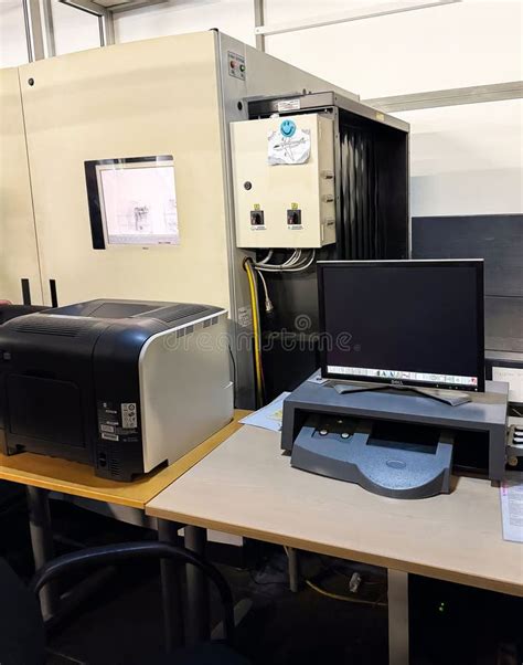 Industrial Control Room With Printer And Computer Setup In Office Environment Editorial Image