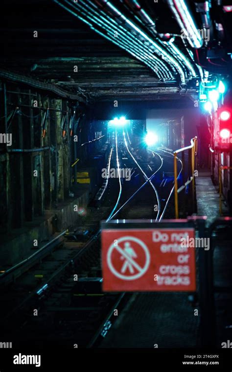 Trains Approaching On The Rails Of A Subway Station In New York City Trains Approaching On The Rails Of A Subway Station In New York City