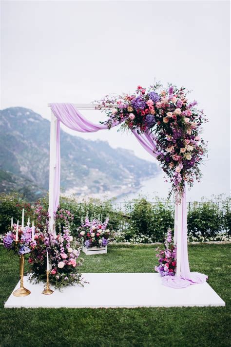 Wedding Arch Purple Wedding Flowers And Fabric Draping Purple