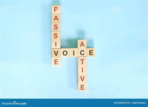 Passive Voice Wooden Block Crossword Puzzle And Pieces Of Chalk On A