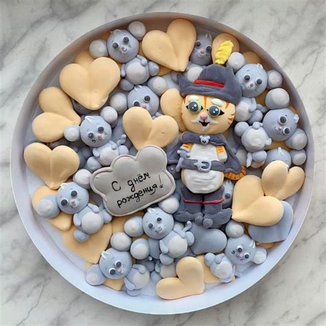 a bowl filled with lots of different shaped cookies