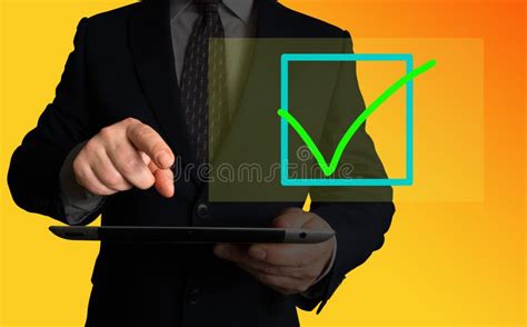Businessman With A Tablet And A Screen Showing A Ticked Checkbox Stock