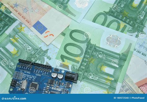 Arduino DIY Board On Euro Banknote Background The Concept Of Modernity Stock Photo Image Of