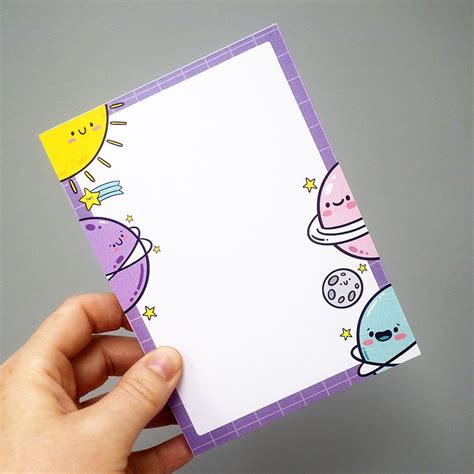 Out Of This World Cuteness A Group Of Happy Planets And Stars Adorn This Notepad With Plenty Of