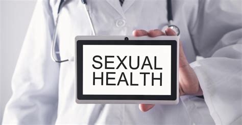 Premium Photo Doctor Showing Sexual Health Text In Tablet Screen