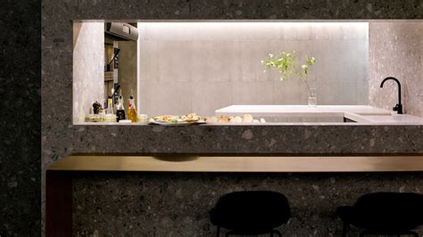 Blocks Of Terrazzo Divide Up Muted Pizza Restaurant In Beijing