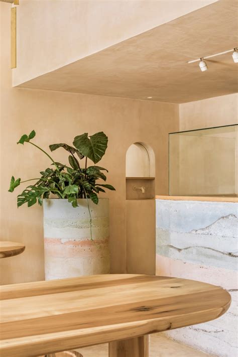 Stripy Concrete Planters Punctuate Maku Poke Bowl Restaurant In Cancun