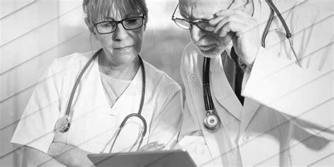 Two Doctors Discussing About Medical Report On Tablet Geometric Pattern Stock Image Image Of