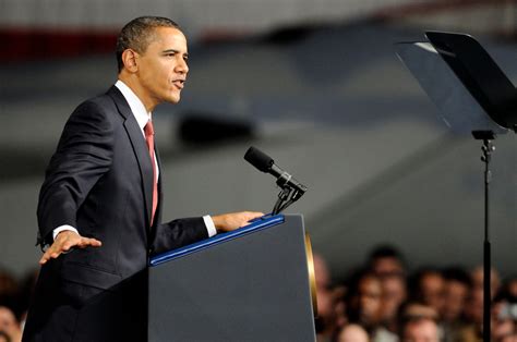 President Barack Obama Gives A Speech To A Crowd Of Military Personnel