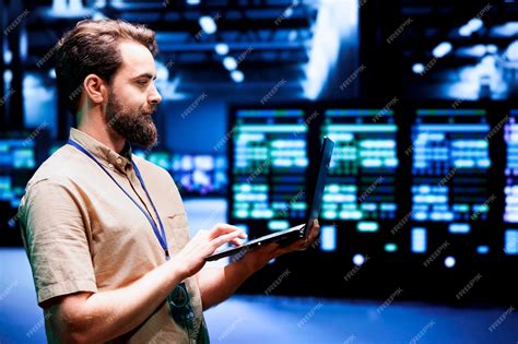 Premium Photo Skillful System Administrator Safeguarding Against Supercomputer Cybersecurity