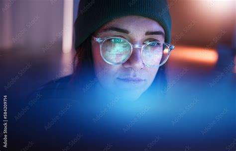 Cybersecurity Database And Woman Hacker Working On A Computer In The Basement At Night For
