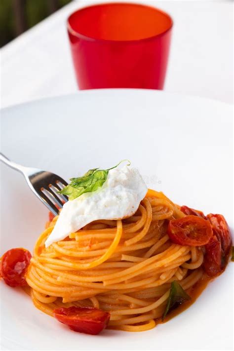 Italian Pasta Spaghetti With Stracciatella Cheese Closeup