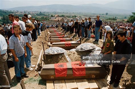 Kosovar Albanians Bury Victims Of A Massacre Which Took Place Five