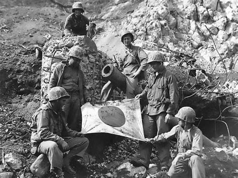 US Marines Capture Japanese Flag On Top Of A Pillbox At Iwo Jima Image