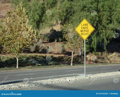 Yellow Left Lane Ends Merge Right Sign On Center Divider Stock Image Image Of Lane Traffic