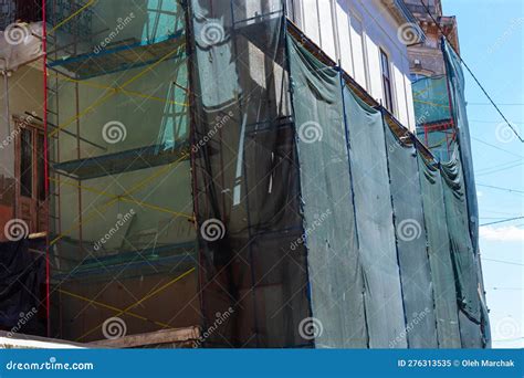 Restoration Of The Building Scaffolding And Protective Green Building