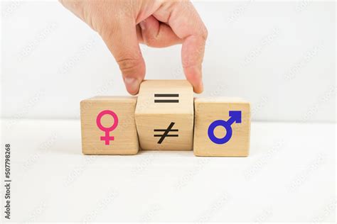 Gender Equality Symbol The Hand Rotates The Cube And Changes The Inequality Sign To An Equal