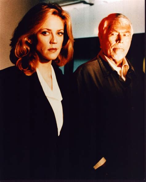 Ally Walker Face Ally Walker And James Coburn In Profiler Photo Print