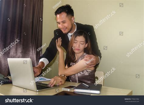 Manager Touching His Secretary Sexual Harassment Stock Photo 770021992 Shutterstock