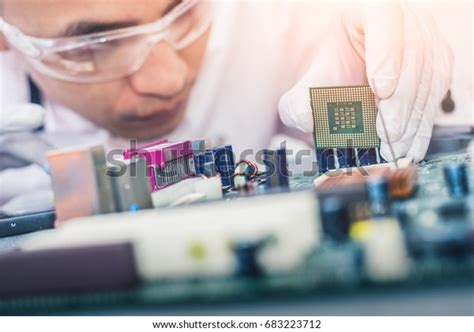 Technician Putting Cpu On Socket Computer Stock Photo Shutterstock