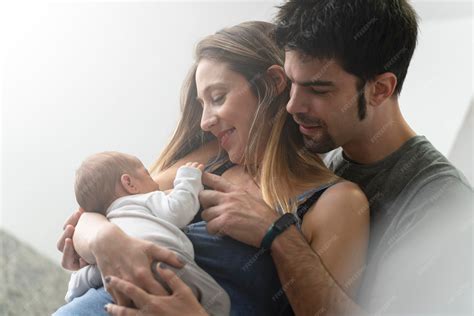 Premium Photo Mother Breastfeeding Her Son In The Kitchen With His