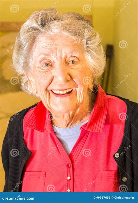 An Old Woman Ninety Years Old Sitting On The Porch Of A Village House