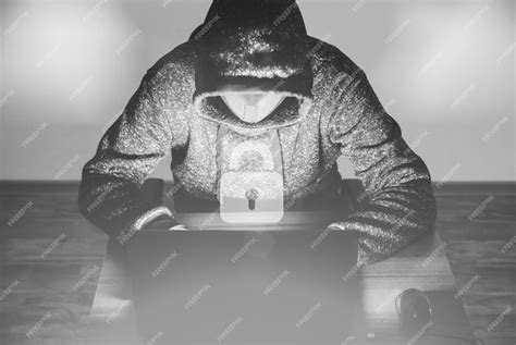 Premium Photo Man In Hoodie Is Hacking Personal Data Information