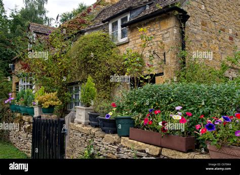 Pretty Cottages Constructed From Tradition Cotswold Stone In Stow On