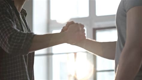 Male Friends Doing Secret Handshake Stock Footage Video 100 Royalty Free 25391483 Shutterstock